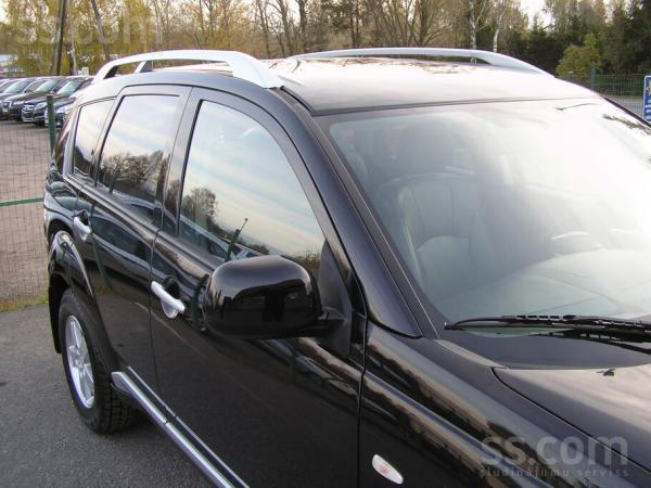 Black Mitsubishi Outlander 2009 in Riga, with an engine capacity of 2.00 L and mileage of 0 thousand km for 6250 €, photo 11 on AUTOMOTO.COM.LV