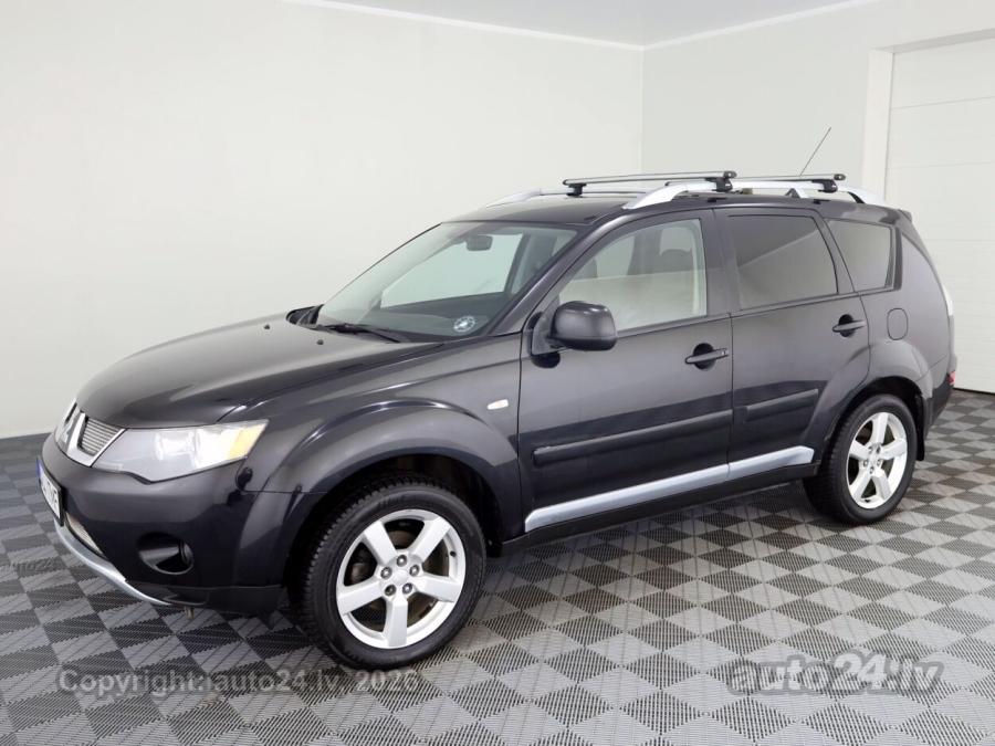Black Mitsubishi Outlander 2009 in Tallinn, with an engine capacity of 2.00 L and mileage of 316 thousand km for 2999 €, photo 2 on AUTOMOTO.COM.LV