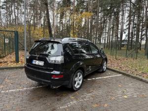 Black Mitsubishi Outlander 2009 in Riga, with an engine capacity of 2.00 L and mileage of 244 thousand km for 2490 €, photo 3 on AUTOMOTO.COM.LV