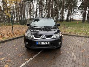 Black Mitsubishi Outlander 2009 in Riga, with an engine capacity of 2.00 L and mileage of 244 thousand km for 2490 €, photo 7 on AUTOMOTO.COM.LV