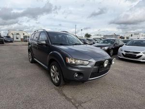 Black Mitsubishi Outlander 2009 in Marijampole, with an engine capacity of 2.00 L and mileage of 229 thousand km for 3350 €, photo 3 on AUTOMOTO.COM.LV