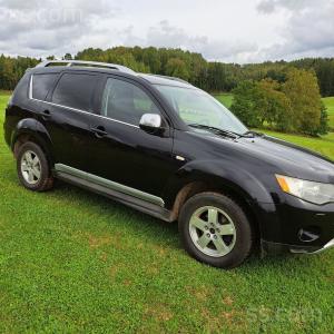 Melns Mitsubishi Outlander 2009 Alūksne, ar dzinēja tilpumu 2.20 L un nobraukumu 326 tūkst. km par 5500 €, foto 4 vietnē AUTOMOTO.COM.LV