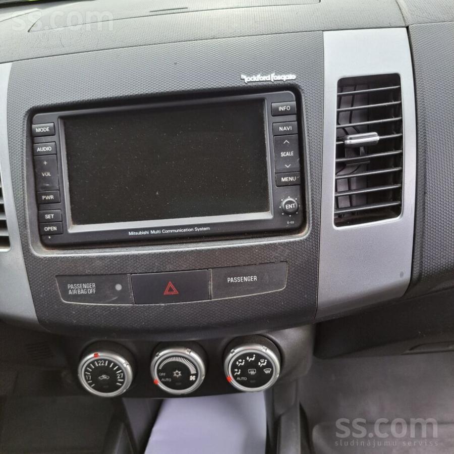 Melns Mitsubishi Outlander 2009 Alūksne, ar dzinēja tilpumu 2.20 L un nobraukumu 326 tūkst. km par 5500 €, foto 10 vietnē AUTOMOTO.COM.LV