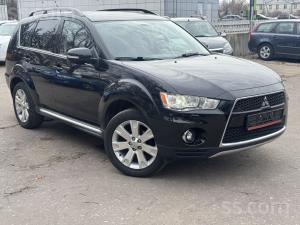 Black Mitsubishi Outlander 2010 in Riga, with an engine capacity of 2.40 L and mileage of 240 thousand km for 4700 €, photo  on AUTOMOTO.COM.LV