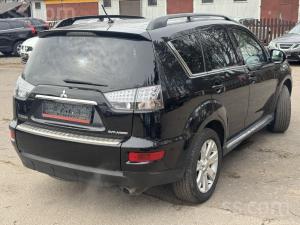 Black Mitsubishi Outlander 2010 in Riga, with an engine capacity of 2.40 L and mileage of 240 thousand km for 4700 €, photo 4 on AUTOMOTO.COM.LV