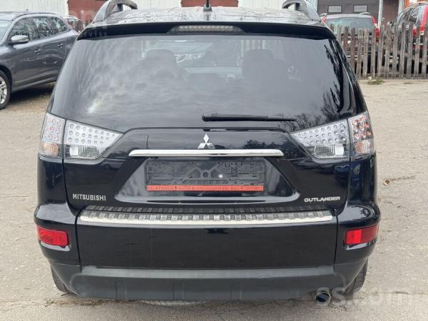 Melns Mitsubishi Outlander 2010 Rīga, ar dzinēja tilpumu 2.40 L un nobraukumu 240 tūkst. km par 4700 €, foto 4 vietnē AUTOMOTO.COM.LV