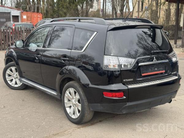 Melns Mitsubishi Outlander 2010 Rīga, ar dzinēja tilpumu 2.40 L un nobraukumu 240 tūkst. km par 4700 €, foto 5 vietnē AUTOMOTO.COM.LV