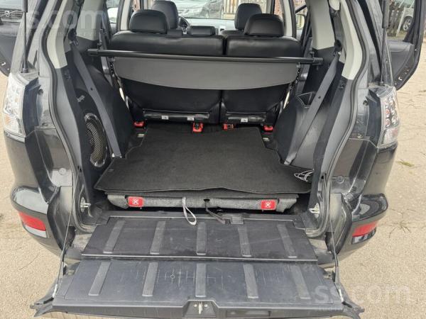 Melns Mitsubishi Outlander 2010 Rīga, ar dzinēja tilpumu 2.40 L un nobraukumu 240 tūkst. km par 4700 €, foto 8 vietnē AUTOMOTO.COM.LV