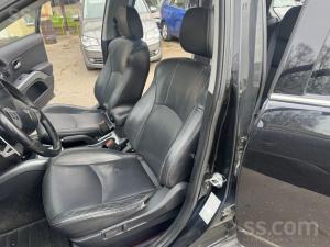 Black Mitsubishi Outlander 2010 in Riga, with an engine capacity of 2.40 L and mileage of 240 thousand km for 4700 €, photo 11 on AUTOMOTO.COM.LV