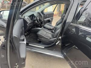 Black Mitsubishi Outlander 2010 in Riga, with an engine capacity of 2.40 L and mileage of 240 thousand km for 4700 €, photo 17 on AUTOMOTO.COM.LV