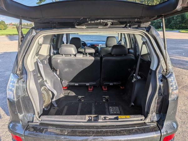 Melns Mitsubishi Outlander 2010 Kauņa, ar dzinēja tilpumu 2.18 L un nobraukumu 299 tūkst. km par 3900 €, foto 9 vietnē AUTOMOTO.COM.LV