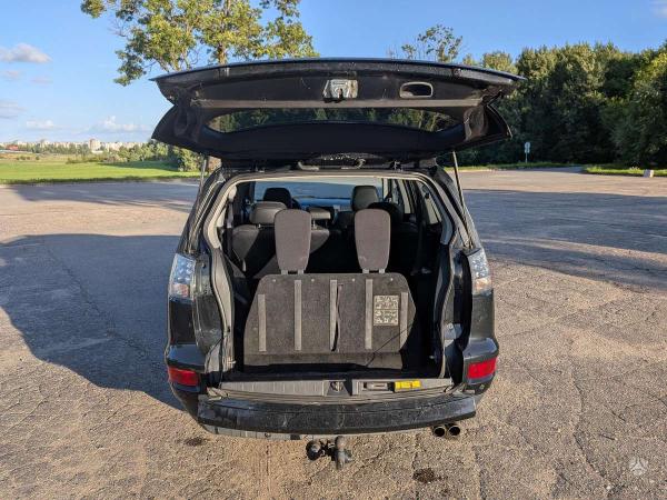 Melns Mitsubishi Outlander 2010 Kauņa, ar dzinēja tilpumu 2.18 L un nobraukumu 299 tūkst. km par 3900 €, foto 10 vietnē AUTOMOTO.COM.LV