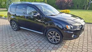 Melns Mitsubishi Outlander 2010 Plungė, ar dzinēja tilpumu 1.97 L un nobraukumu 185 tūkst. km par 3700 €, foto 4 vietnē AUTOMOTO.COM.LV
