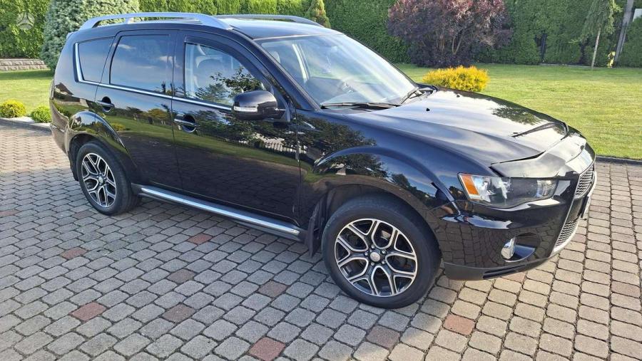 Melns Mitsubishi Outlander 2010 Plungė, ar dzinēja tilpumu 1.97 L un nobraukumu 185 tūkst. km par 3700 €, foto 4 vietnē AUTOMOTO.COM.LV