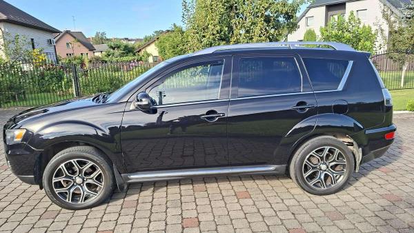 Melns Mitsubishi Outlander 2010 Plungė, ar dzinēja tilpumu 1.97 L un nobraukumu 185 tūkst. km par 3700 €, foto 6 vietnē AUTOMOTO.COM.LV