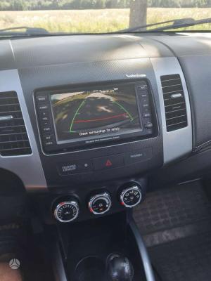 Melns Mitsubishi Outlander 2010 Panevēža, ar dzinēja tilpumu 2.18 L un nobraukumu 331 tūkst. km par 4200 €, foto 11 vietnē AUTOMOTO.COM.LV