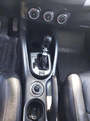Melns Mitsubishi Outlander 2010 Panevēža, ar dzinēja tilpumu 2.18 L un nobraukumu 331 tūkst. km par 4200 €, foto 12 vietnē AUTOMOTO.COM.LV
