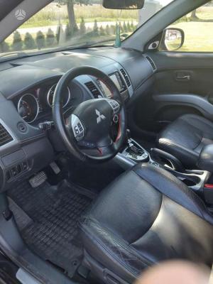 Melns Mitsubishi Outlander 2010 Panevēža, ar dzinēja tilpumu 2.18 L un nobraukumu 331 tūkst. km par 4200 €, foto 13 vietnē AUTOMOTO.COM.LV