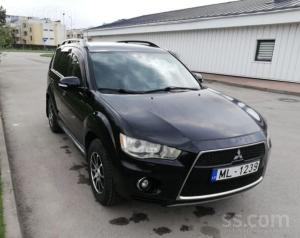 Black Mitsubishi Outlander 2010 in Riga, with an engine capacity of 2.20 L and mileage of 230 thousand km for 5000 €, photo  on AUTOMOTO.COM.LV