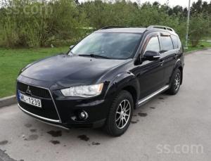 Black Mitsubishi Outlander 2010 in Riga, with an engine capacity of 2.20 L and mileage of 230 thousand km for 5000 €, photo 4 on AUTOMOTO.COM.LV