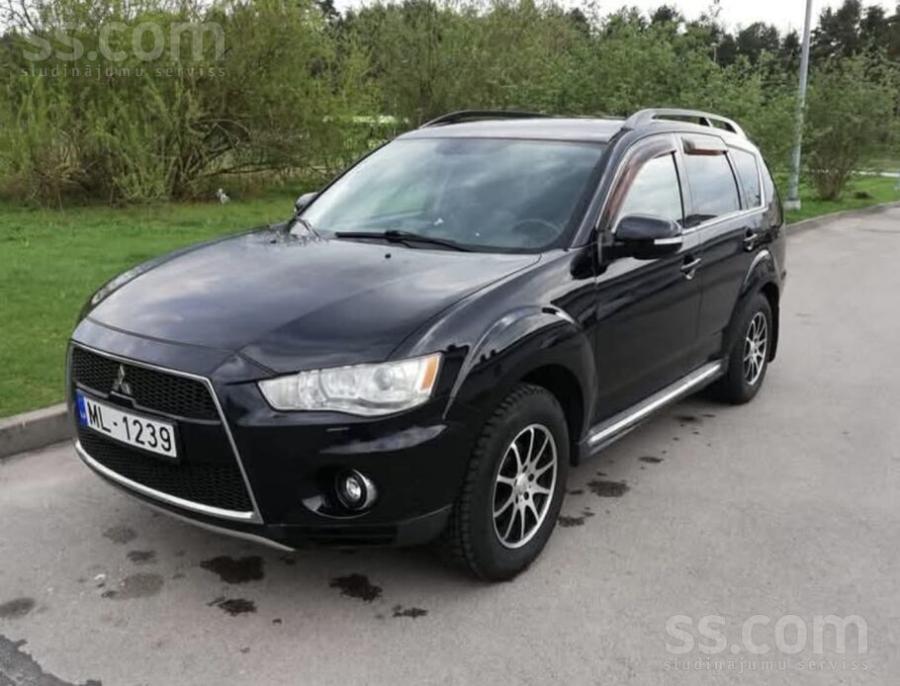Black Mitsubishi Outlander 2010 in Riga, with an engine capacity of 2.20 L and mileage of 230 thousand km for 5000 €, photo 4 on AUTOMOTO.COM.LV