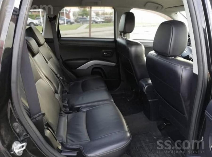 Black Mitsubishi Outlander 2010 in Riga, with an engine capacity of 2.20 L and mileage of 230 thousand km for 5000 €, photo 7 on AUTOMOTO.COM.LV