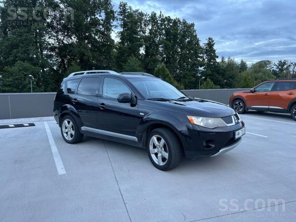 Melns Mitsubishi Outlander 2010 Rīga, ar dzinēja tilpumu 2.40 L un nobraukumu 192 tūkst. km par 4000 €, foto 4 vietnē AUTOMOTO.COM.LV