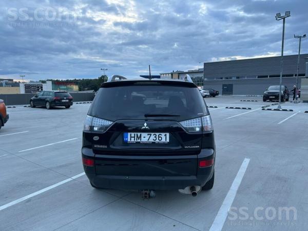 Melns Mitsubishi Outlander 2010 Rīga, ar dzinēja tilpumu 2.40 L un nobraukumu 192 tūkst. km par 4000 €, foto 5 vietnē AUTOMOTO.COM.LV