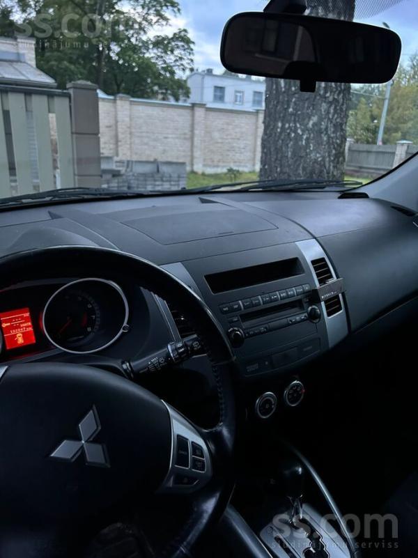 Melns Mitsubishi Outlander 2010 Rīga, ar dzinēja tilpumu 2.40 L un nobraukumu 192 tūkst. km par 4000 €, foto 6 vietnē AUTOMOTO.COM.LV