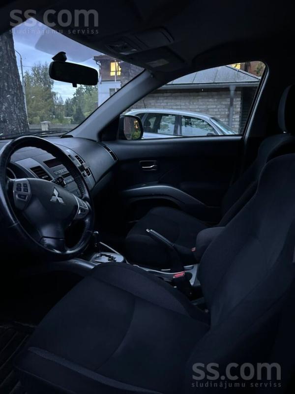 Melns Mitsubishi Outlander 2010 Rīga, ar dzinēja tilpumu 2.40 L un nobraukumu 192 tūkst. km par 4000 €, foto 8 vietnē AUTOMOTO.COM.LV