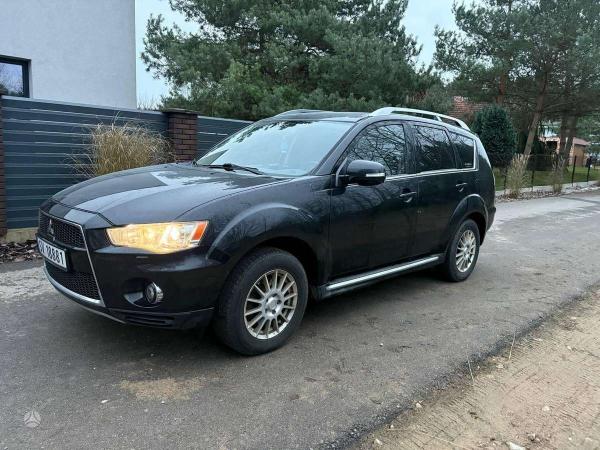 Melns Mitsubishi Outlander 2011 Kauņa, ar dzinēja tilpumu 1.97 L un nobraukumu 290 tūkst. km par 3590 €, foto 1 vietnē AUTOMOTO.COM.LV