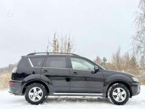 Black Mitsubishi Outlander 2011 in Siauliai, with an engine capacity of 2.20 L and mileage of 226 thousand km for 7650 €, photo 14 on AUTOMOTO.COM.LV