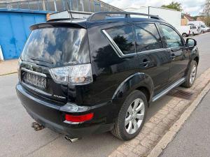 Melns Mitsubishi Outlander 2011 Kauņa, ar dzinēja tilpumu 2.18 L un nobraukumu 211 tūkst. km par 2950 €, foto 4 vietnē AUTOMOTO.COM.LV
