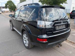 Melns Mitsubishi Outlander 2011 Kauņa, ar dzinēja tilpumu 2.18 L un nobraukumu 211 tūkst. km par 2950 €, foto 5 vietnē AUTOMOTO.COM.LV