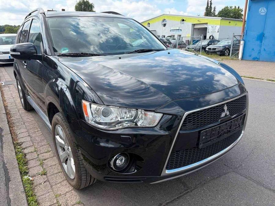 Melns Mitsubishi Outlander 2011 Klaipėda, ar dzinēja tilpumu 2.18 L un nobraukumu 211 tūkst. km par 2750 €, foto 3 vietnē AUTOMOTO.COM.LV
