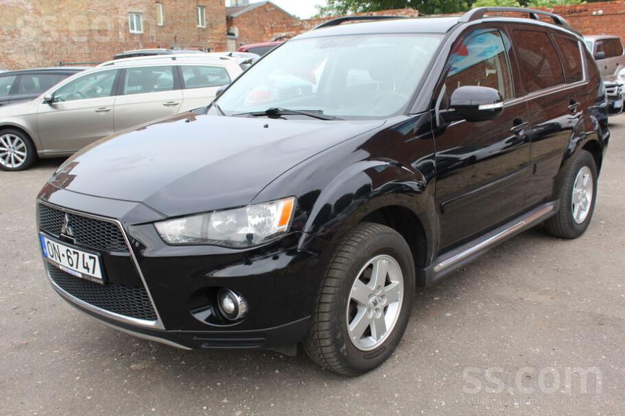 Melns Mitsubishi Outlander 2011 Liepāja, ar dzinēja tilpumu 2.30 L un nobraukumu 327 tūkst. km par 4650 €, foto 3 vietnē AUTOMOTO.COM.LV