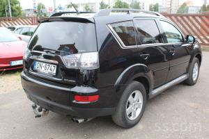 Melns Mitsubishi Outlander 2011 Liepāja, ar dzinēja tilpumu 2.30 L un nobraukumu 327 tūkst. km par 4650 €, foto 5 vietnē AUTOMOTO.COM.LV