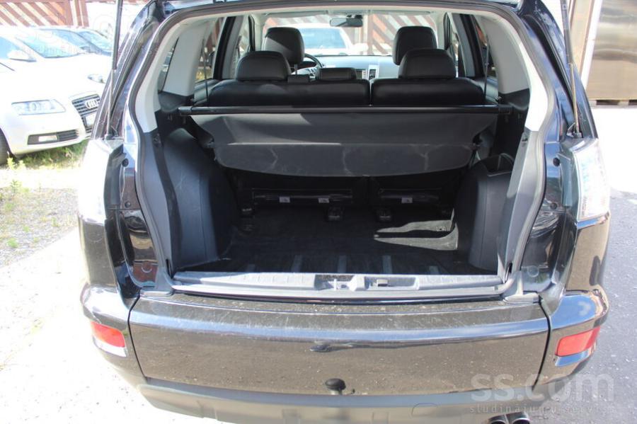 Melns Mitsubishi Outlander 2011 Liepāja, ar dzinēja tilpumu 2.30 L un nobraukumu 327 tūkst. km par 4650 €, foto 6 vietnē AUTOMOTO.COM.LV