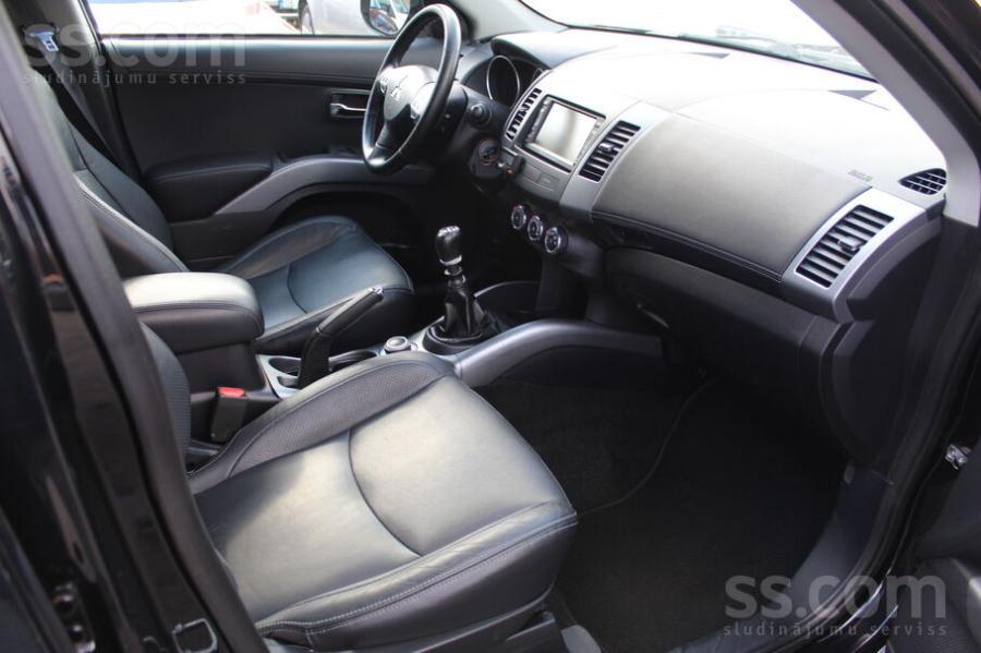 Melns Mitsubishi Outlander 2011 Liepāja, ar dzinēja tilpumu 2.30 L un nobraukumu 327 tūkst. km par 4650 €, foto 9 vietnē AUTOMOTO.COM.LV
