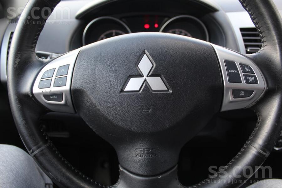 Melns Mitsubishi Outlander 2011 Liepāja, ar dzinēja tilpumu 2.30 L un nobraukumu 327 tūkst. km par 4650 €, foto 16 vietnē AUTOMOTO.COM.LV