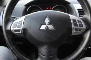 Black Mitsubishi Outlander 2011 in Liepaja, with an engine capacity of 2.30 L and mileage of 327 thousand km for 4650 €, photo 16 on AUTOMOTO.COM.LV