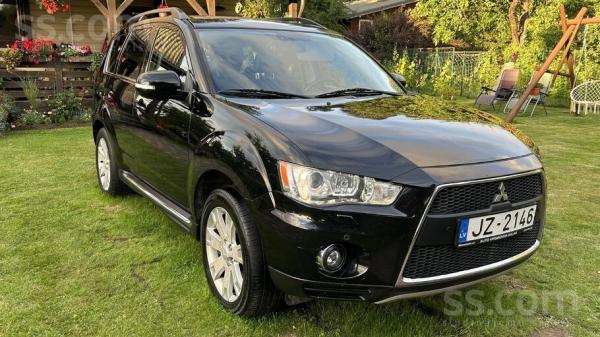 Melns Mitsubishi Outlander 2011 Rīga, ar dzinēja tilpumu 2.20 L un nobraukumu 309 tūkst. km par 4300 €, foto 2 vietnē AUTOMOTO.COM.LV
