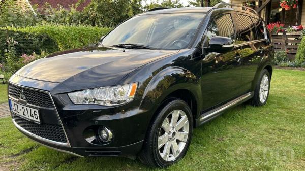 Melns Mitsubishi Outlander 2011 Rīga, ar dzinēja tilpumu 2.20 L un nobraukumu 309 tūkst. km par 4300 €, foto 3 vietnē AUTOMOTO.COM.LV