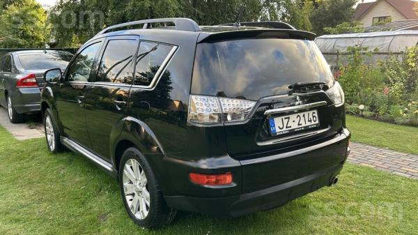 Melns Mitsubishi Outlander 2011 Rīga, ar dzinēja tilpumu 2.20 L un nobraukumu 309 tūkst. km par 4300 €, foto 4 vietnē AUTOMOTO.COM.LV
