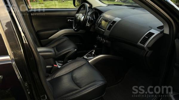 Melns Mitsubishi Outlander 2011 Rīga, ar dzinēja tilpumu 2.20 L un nobraukumu 309 tūkst. km par 4300 €, foto 7 vietnē AUTOMOTO.COM.LV