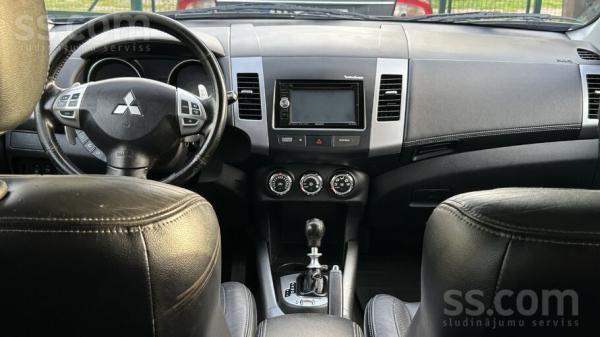 Melns Mitsubishi Outlander 2011 Rīga, ar dzinēja tilpumu 2.20 L un nobraukumu 309 tūkst. km par 4300 €, foto 8 vietnē AUTOMOTO.COM.LV