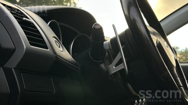 Melns Mitsubishi Outlander 2011 Rīga, ar dzinēja tilpumu 2.20 L un nobraukumu 309 tūkst. km par 4300 €, foto 9 vietnē AUTOMOTO.COM.LV