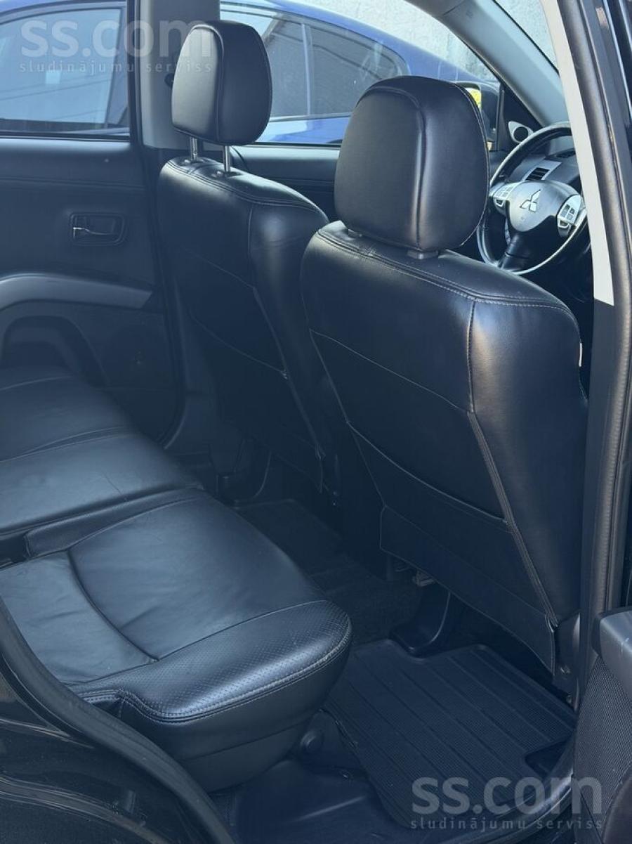 Melns Mitsubishi Outlander 2011 Rīga, ar dzinēja tilpumu 2.20 L un nobraukumu 309 tūkst. km par 3680 €, foto 13 vietnē AUTOMOTO.COM.LV