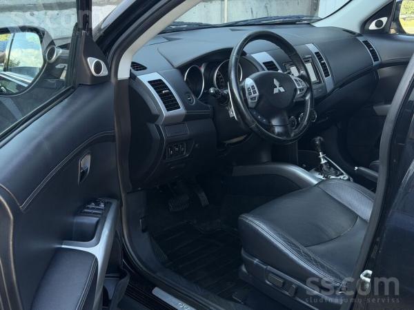 Melns Mitsubishi Outlander 2011 Rīga, ar dzinēja tilpumu 2.20 L un nobraukumu 309 tūkst. km par 3680 €, foto 7 vietnē AUTOMOTO.COM.LV