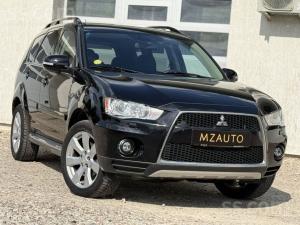 Melns Mitsubishi Outlander 2011 Tukums, ar dzinēja tilpumu 2.20 L un nobraukumu 227 tūkst. km par 6599 €, foto  vietnē AUTOMOTO.COM.LV
